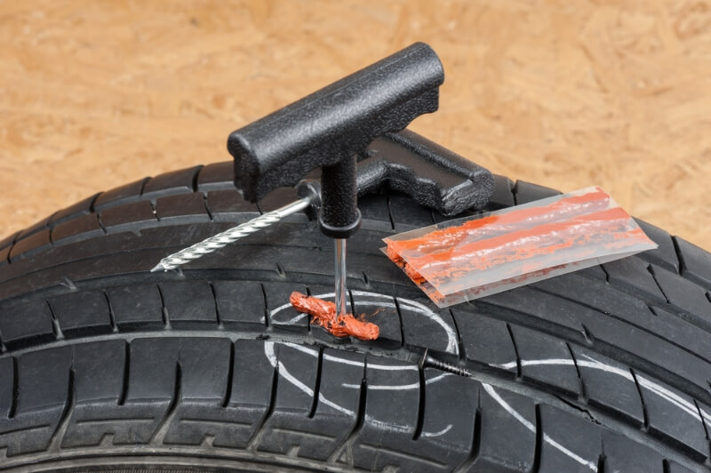 How to Repair a Flat Tire While on the Road?
